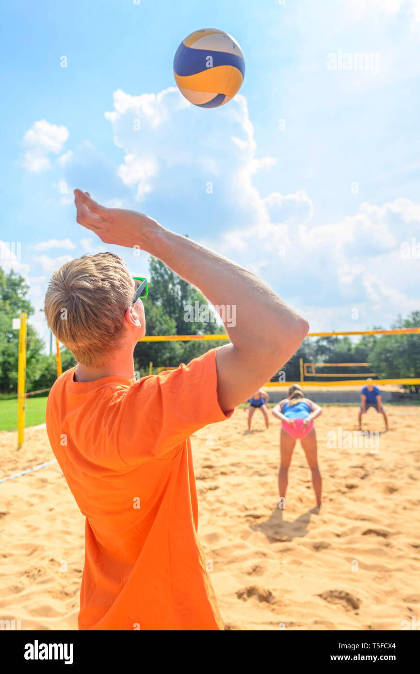 Trendy summer sport - Beachvolleyball Stock Photo - Alamy