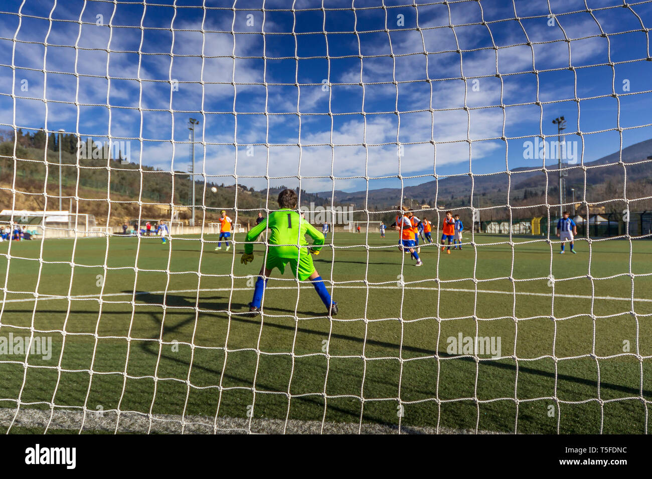Goalkeeper in action Stock Photo - Alamy