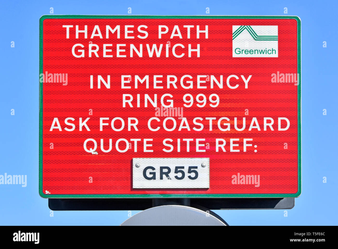 Coastguard call 999 emergency services contact details on red footpath ...