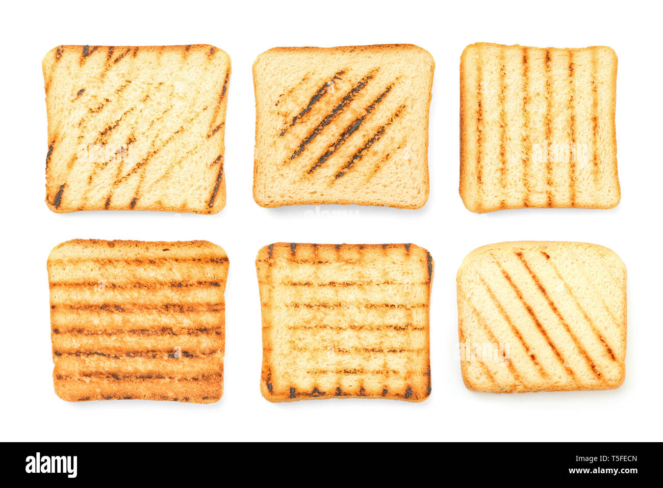 Different tasty toasted bread on white background Stock Photo - Alamy