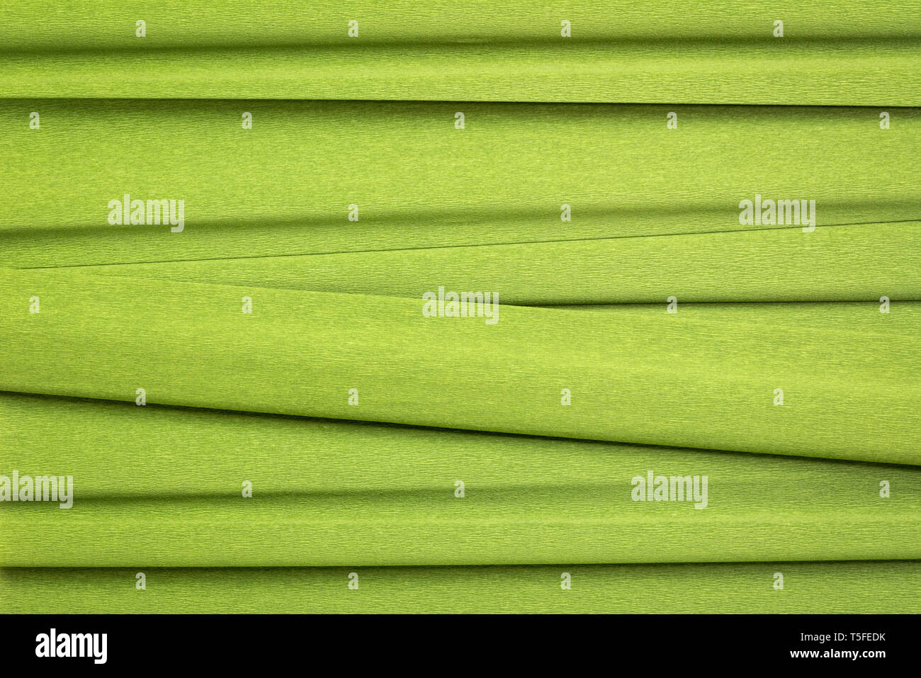 green crepe paper - background with crinkled texture Stock Photo - Alamy