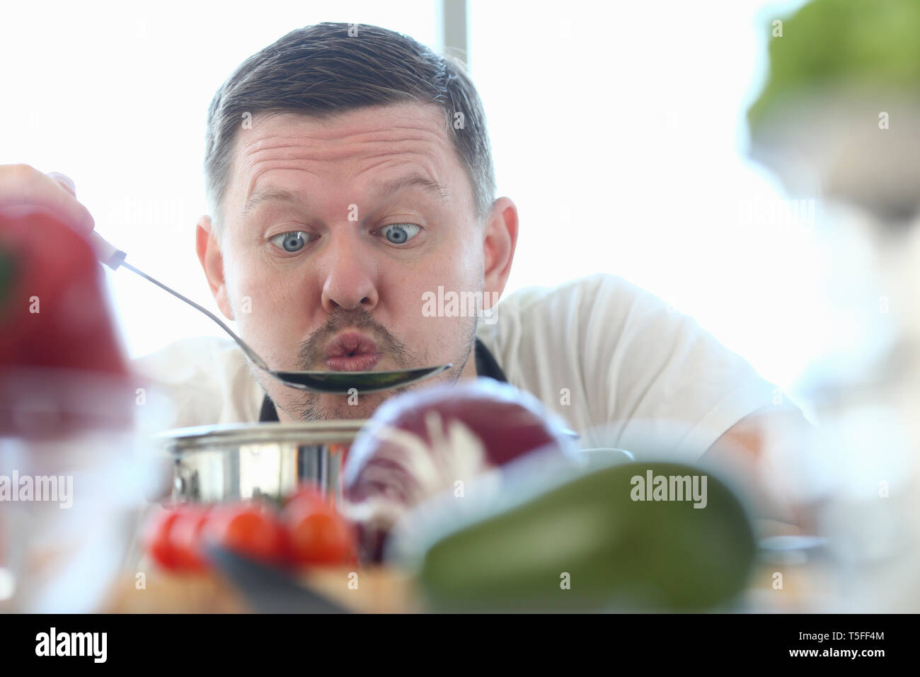 Funny Face Vlogger Chef Blowing Kitchen Spoon Stock Photo - Alamy