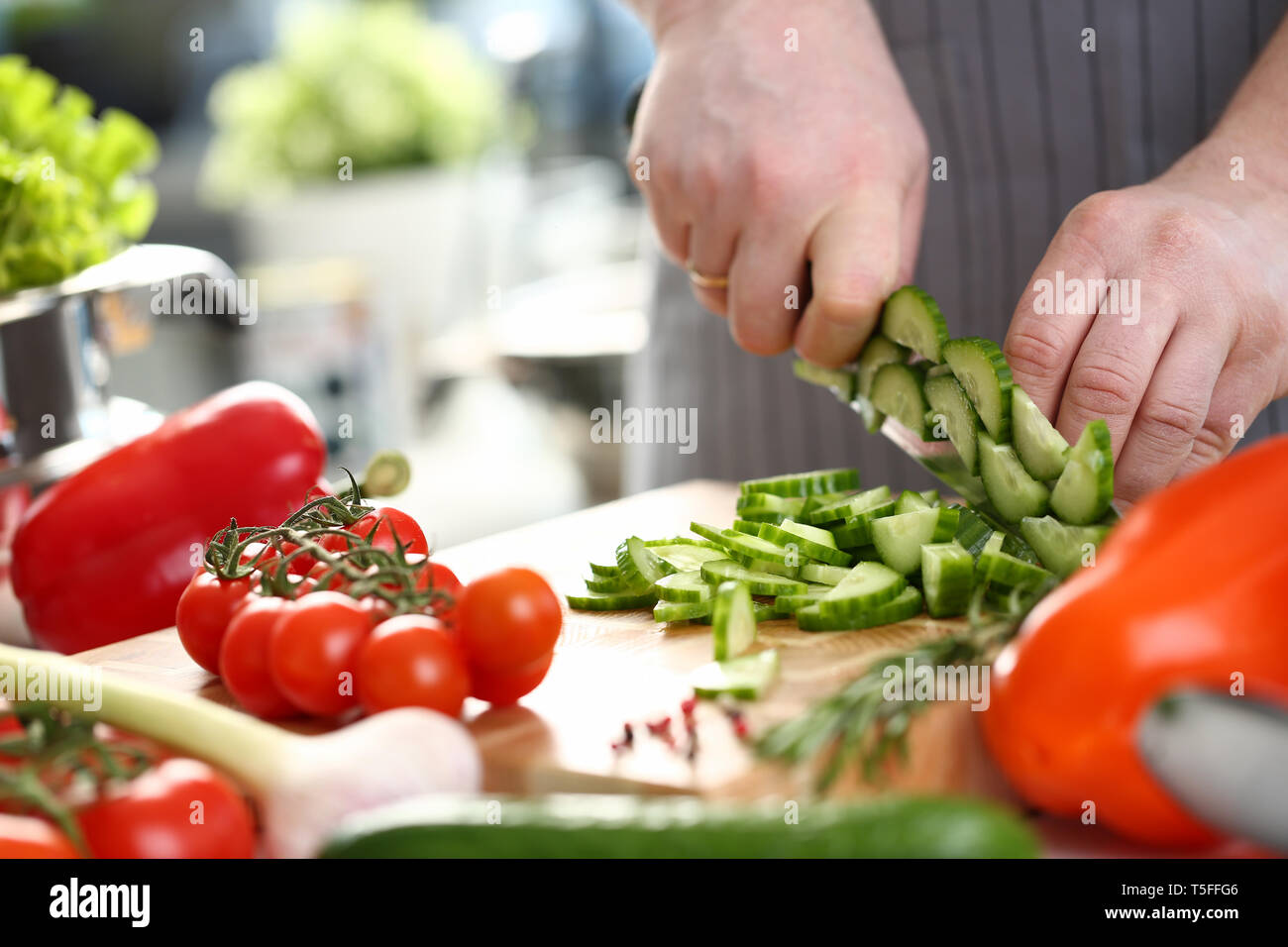 Professional Chef Hand Chopping Fresh Cucumber Stock Photo - Alamy