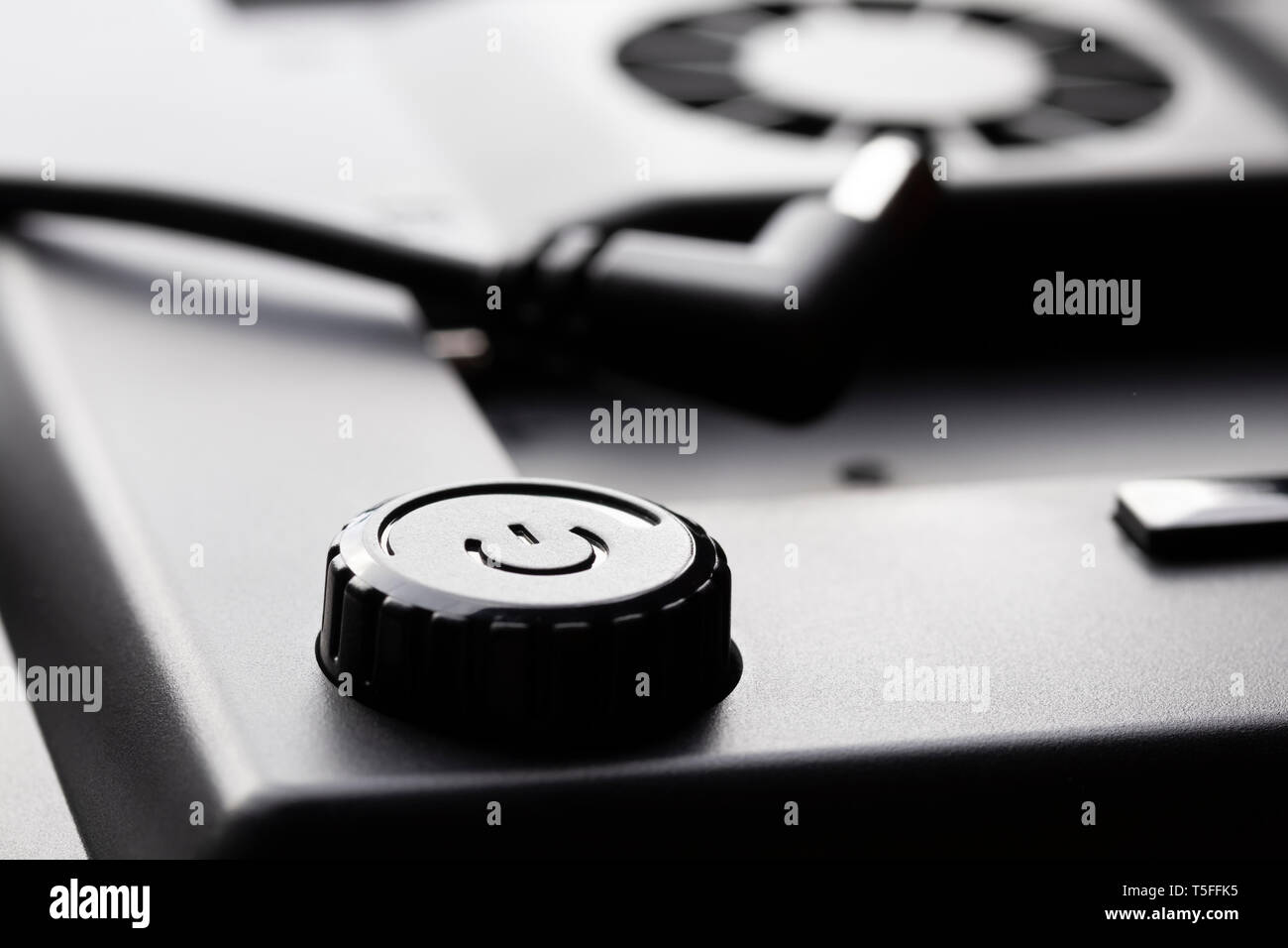 Black plastic power button with power adjustment function. 12 volt plug ...