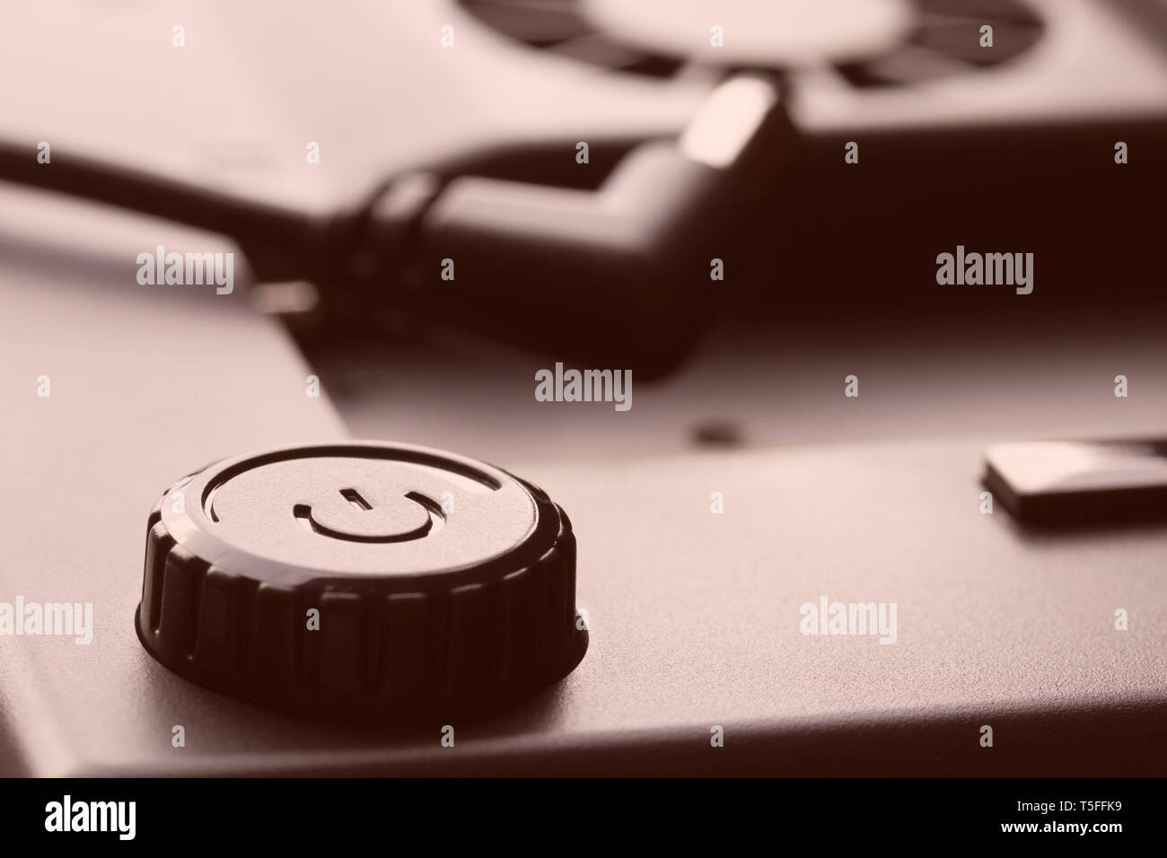 Black plastic power button with power adjustment function. 12 volt plug ...