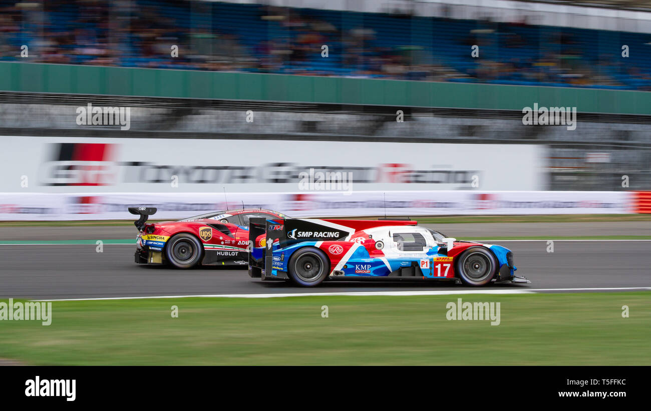 An SMP Racing LMP1 car passes a Ferrari during the WEC 6 Hours of ...
