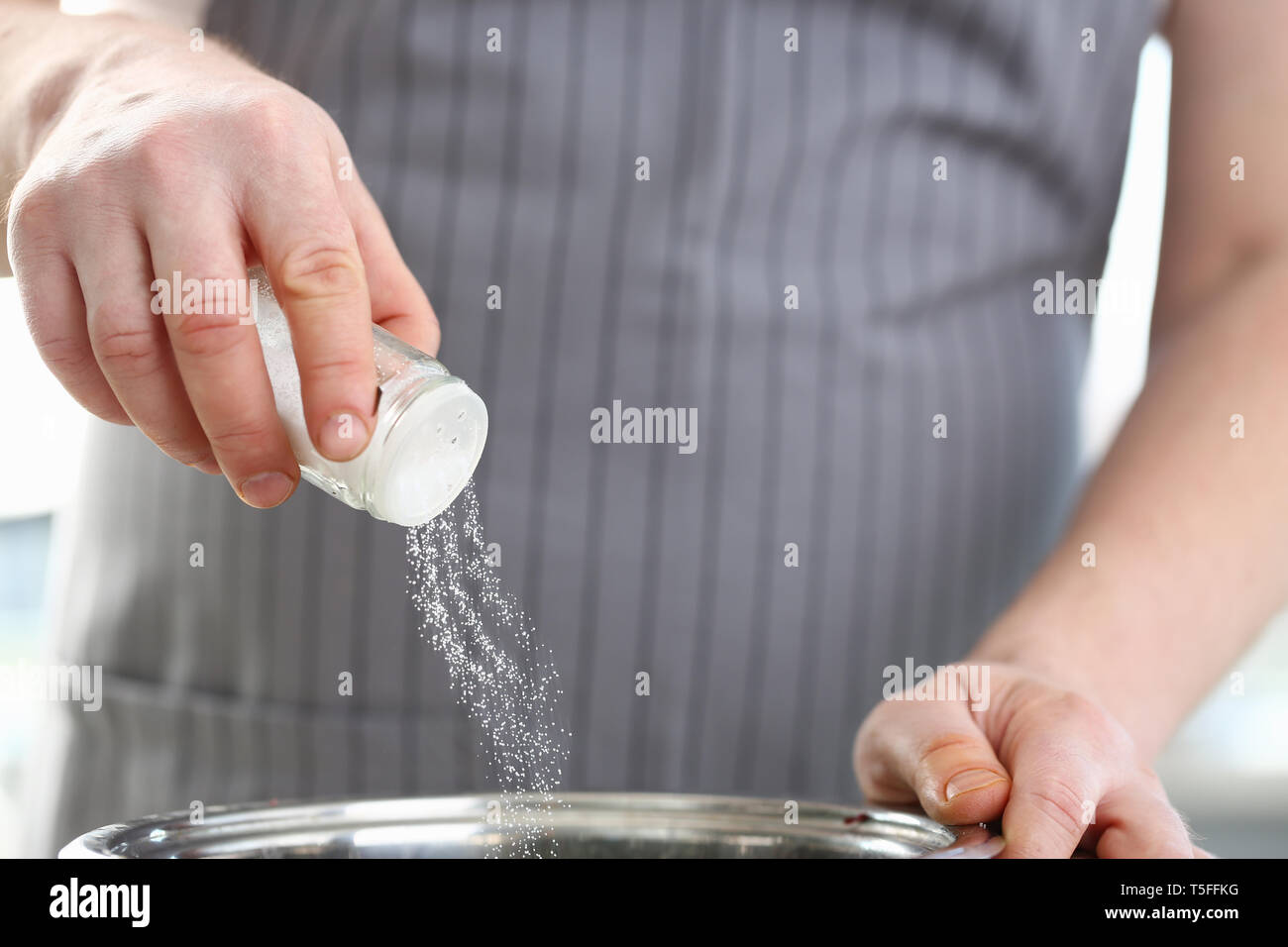 View hands chef adding hi-res stock photography and images - Alamy