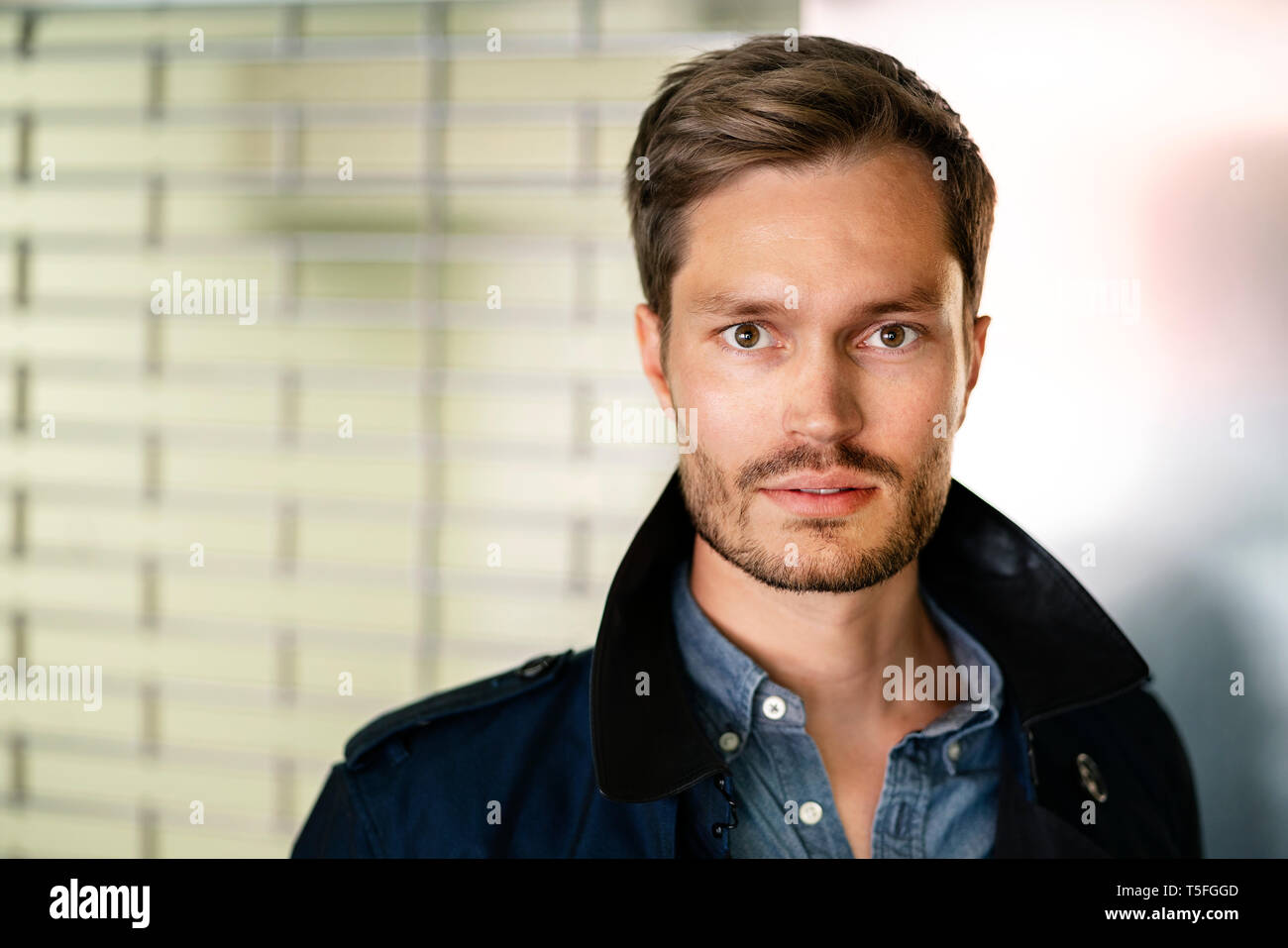 Portrait mid adult man looking hi-res stock photography and images - Alamy