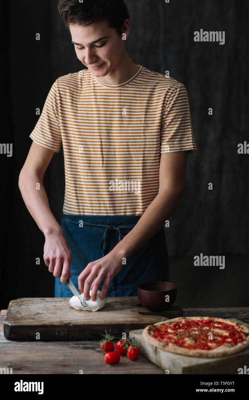 Man with pizza hi-res stock photography and images - Alamy
