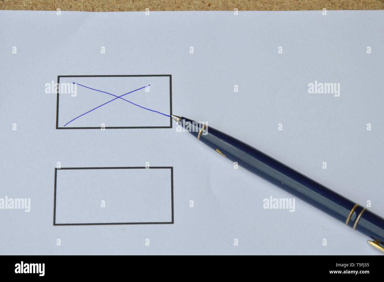 pen filled cross sign in the blank on white paper Stock Photo - Alamy