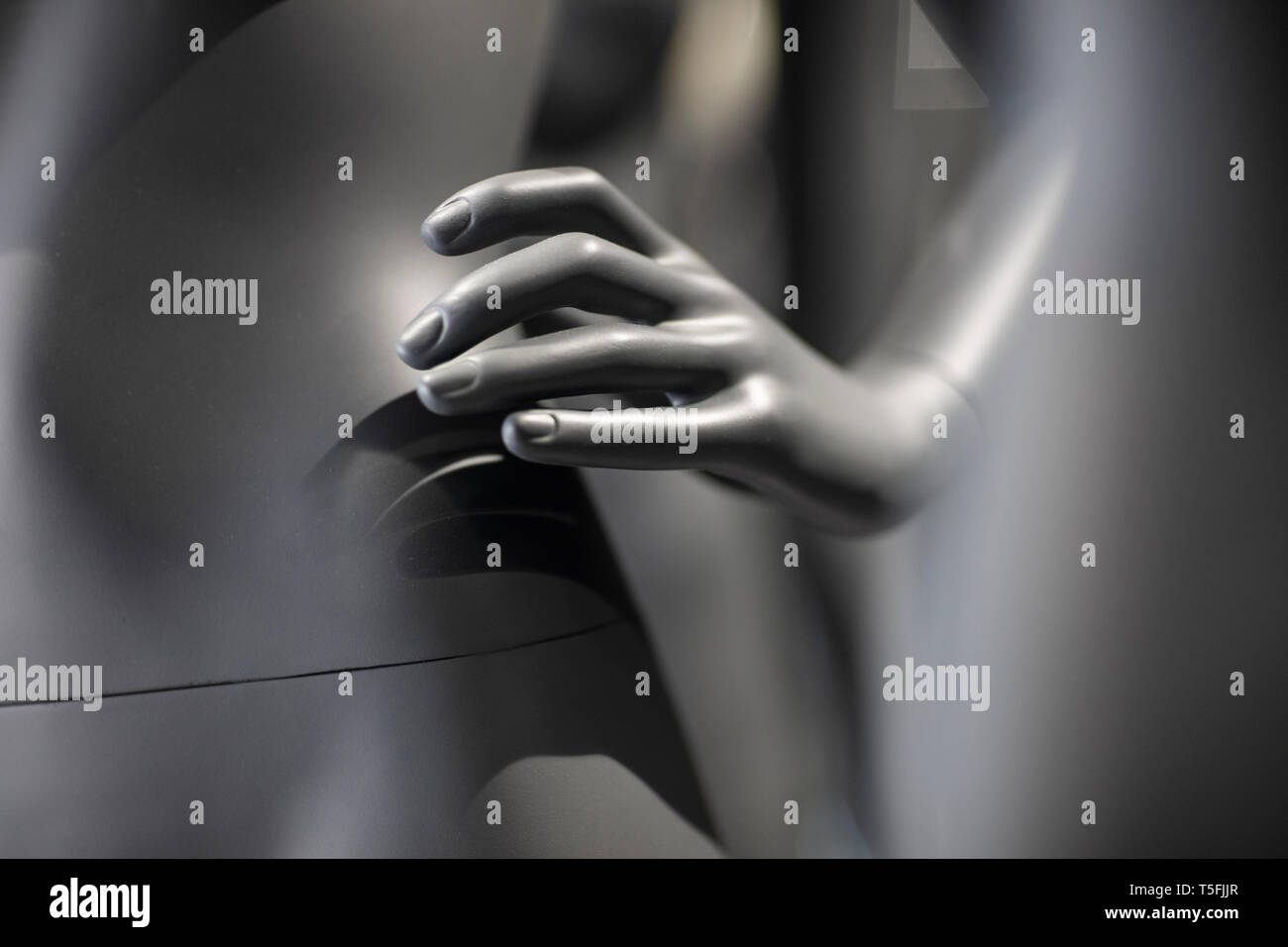 Grey hand hi-res stock photography and images - Alamy