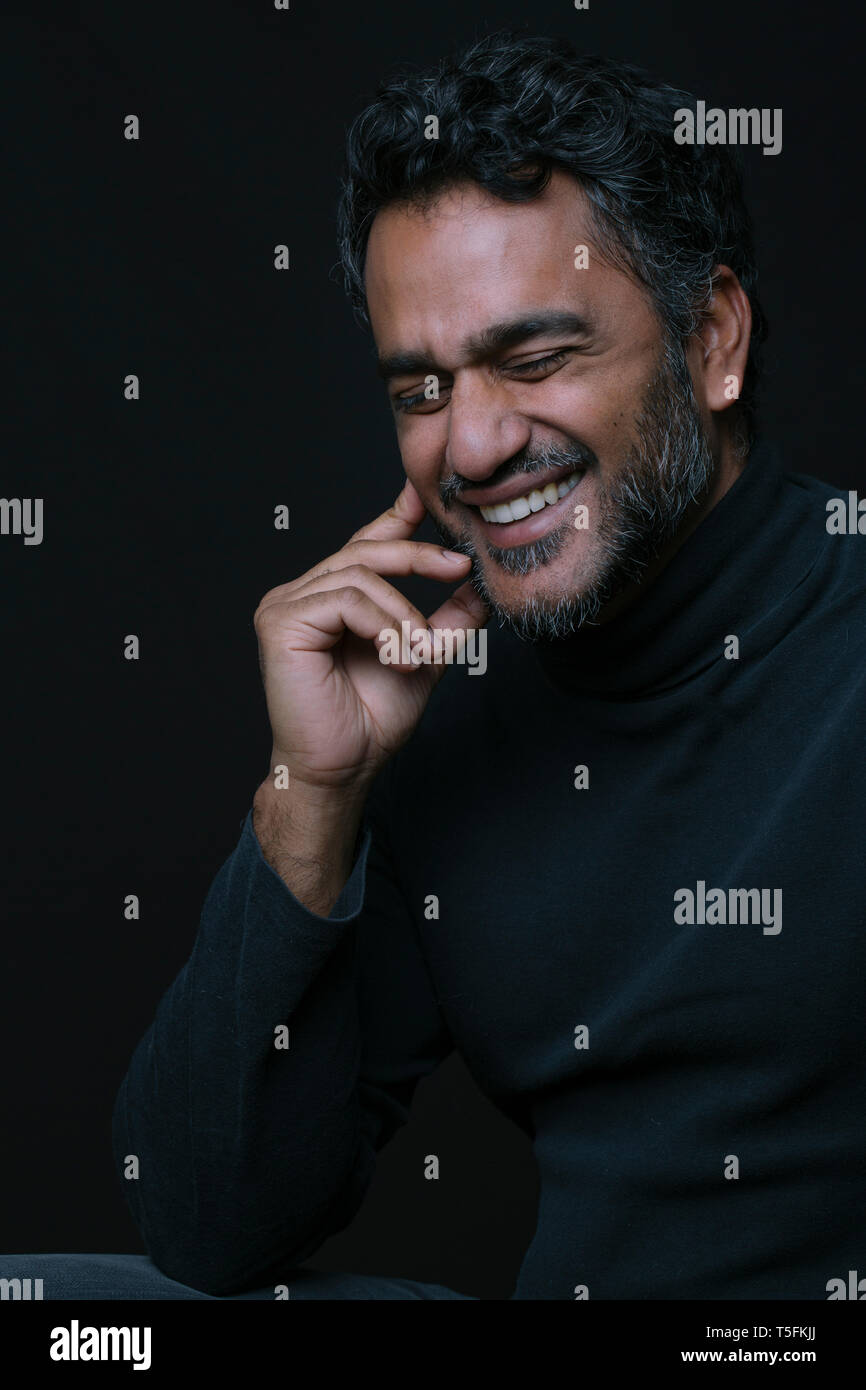Indian man smiling hi-res stock photography and images - Alamy