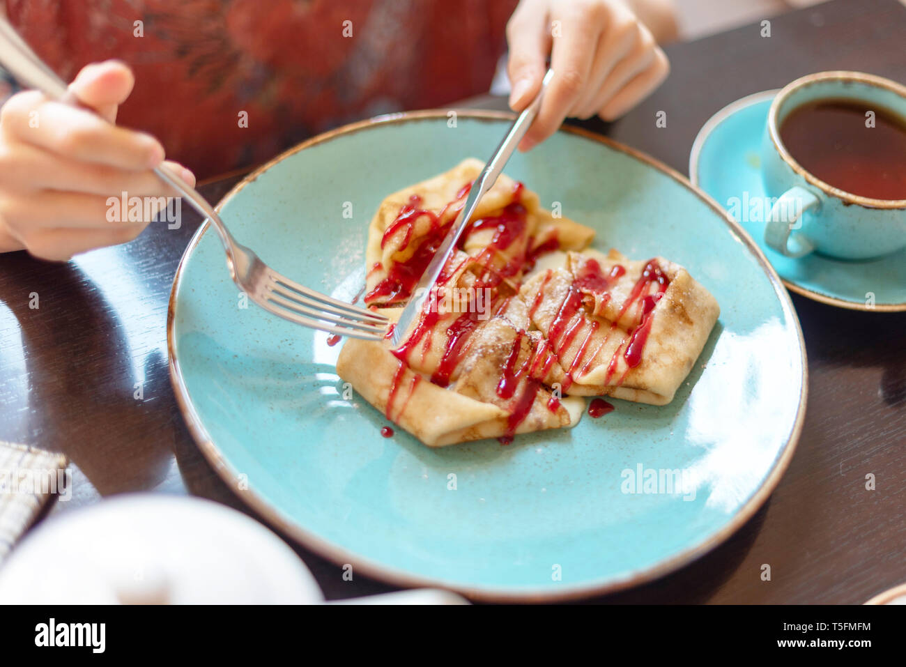 Girl Eating Pancake High Resolution Stock Photography and Images - Alamy