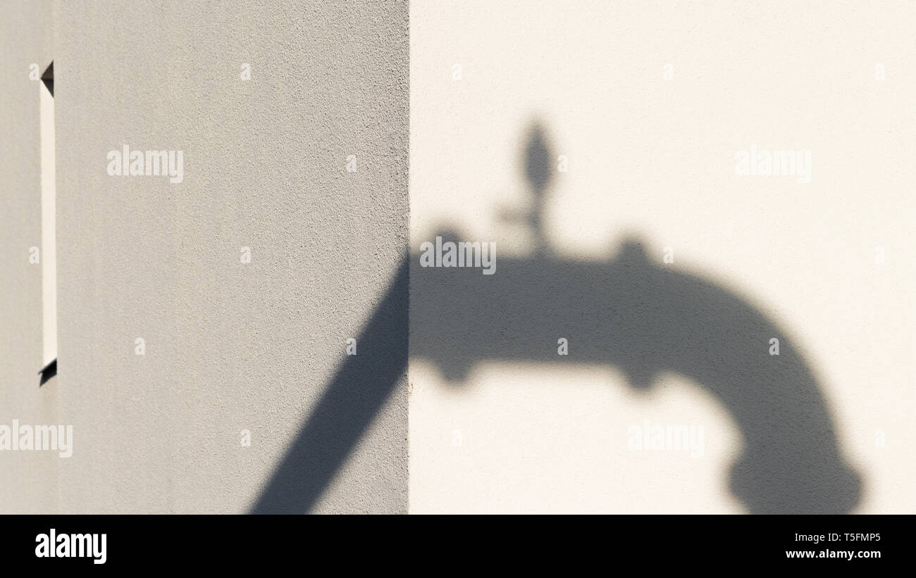 Shadow of a water pipe with a window Stock Photo - Alamy