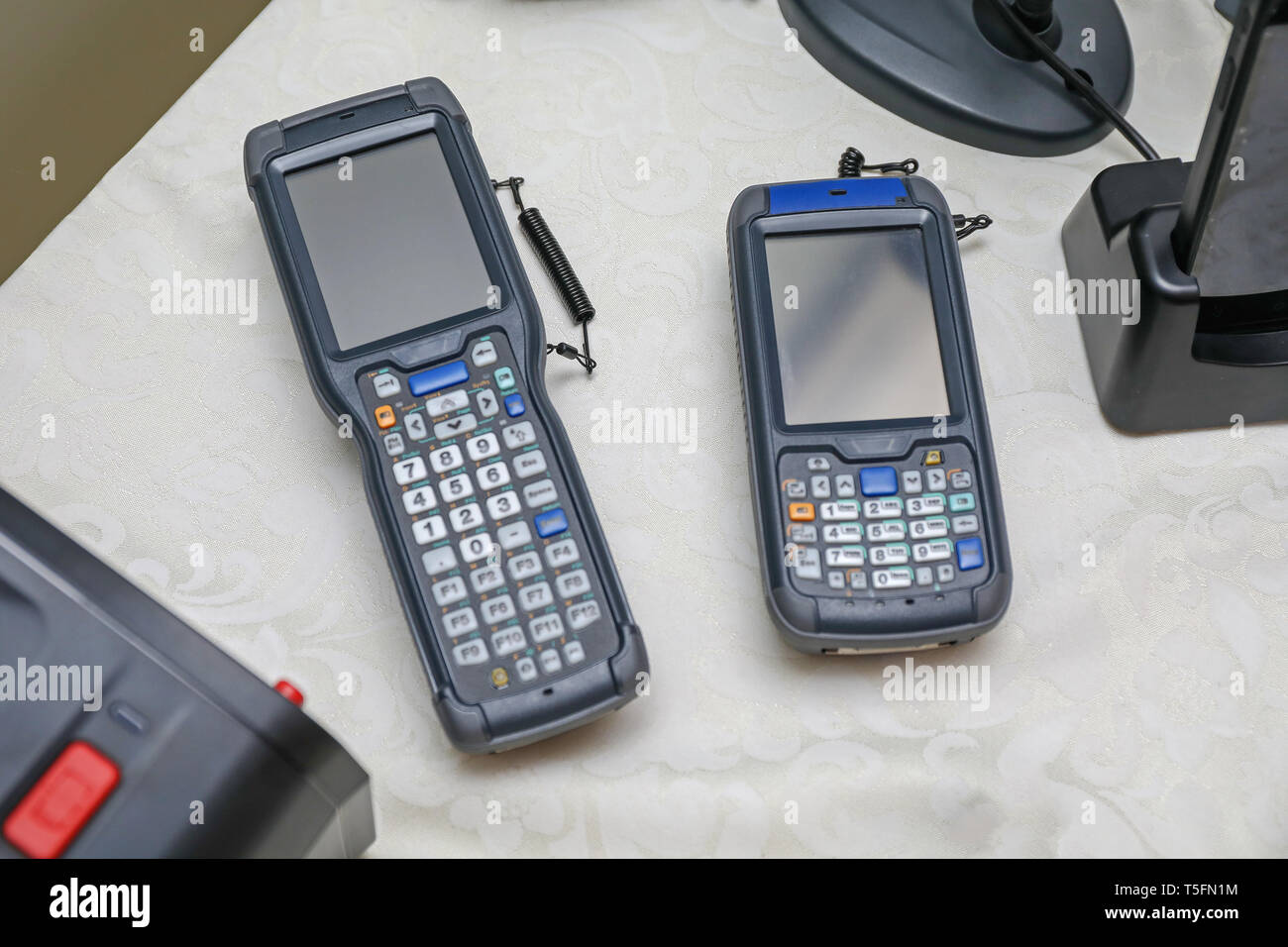 Two handheld barcode reader scanner computer devices hi-res stock ...