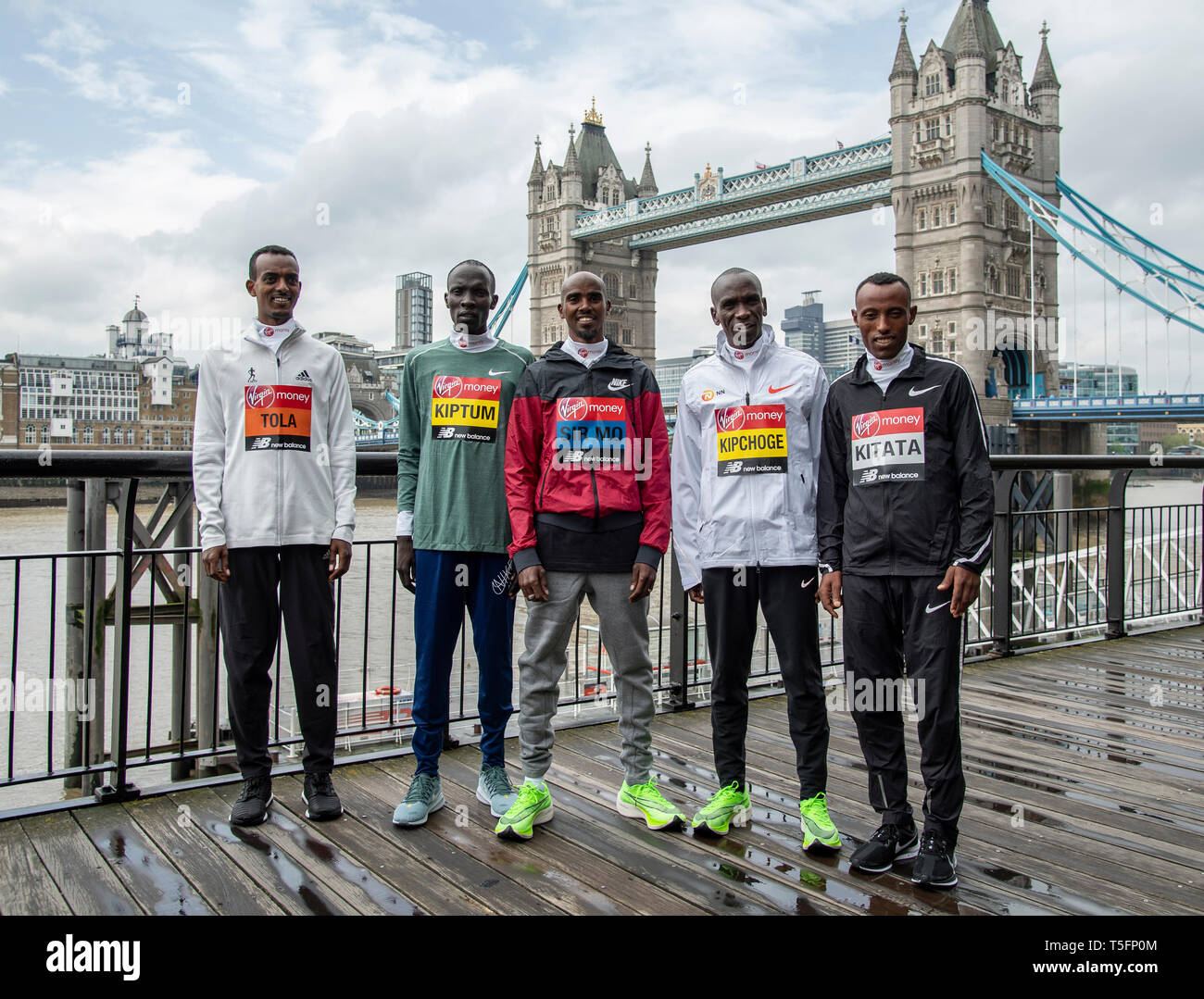 (L-R) Tamirat Tola, Abraham Kiptum, Sir Mo Farah, Eliud Kipchoge and ...