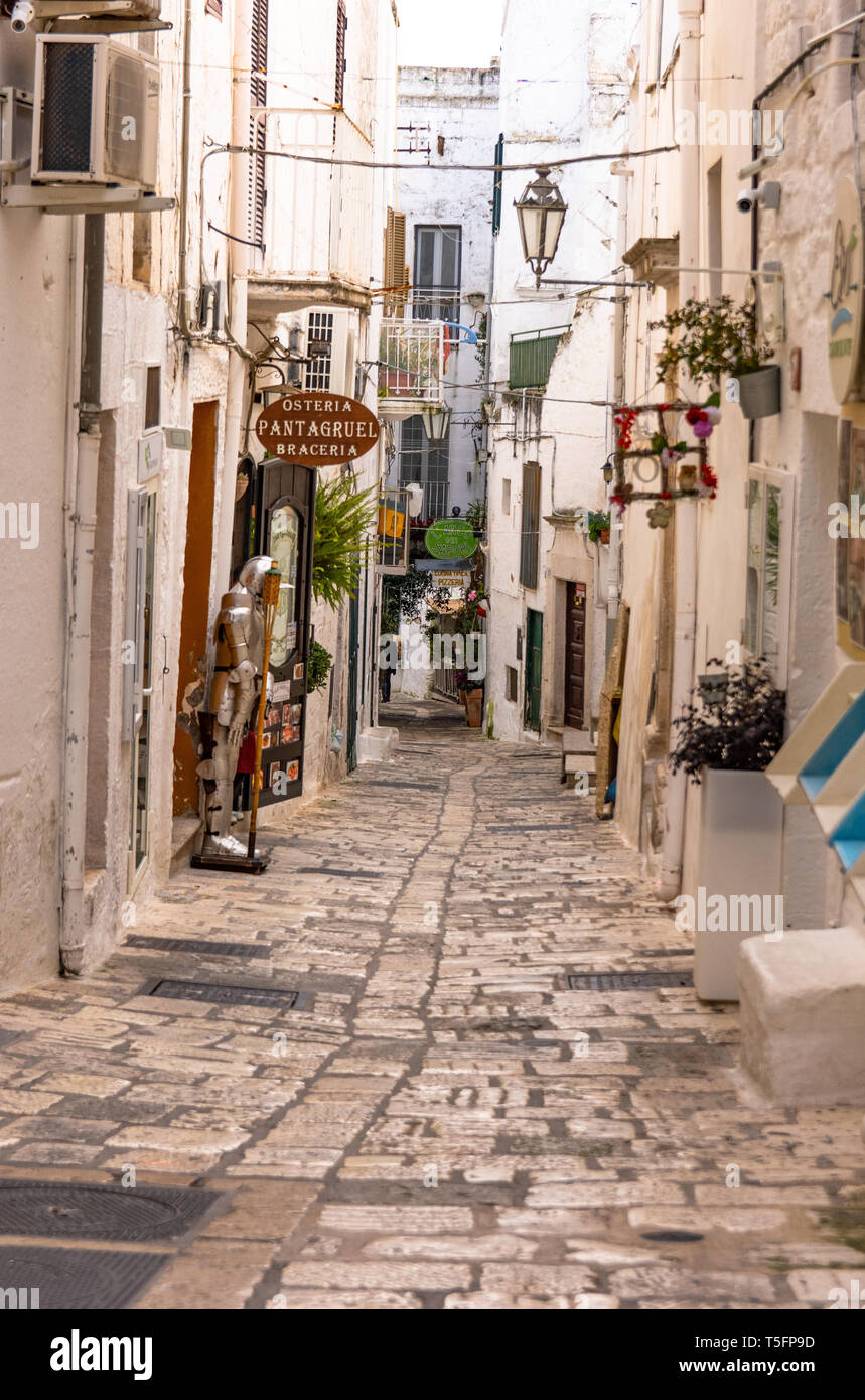 Italy, Ostuni, a typical street in the ancient historic center Stock ...