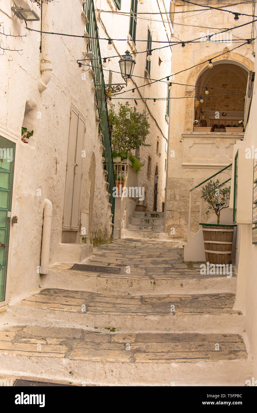 Italy, Ostuni, a typical street in the ancient historic center Stock ...