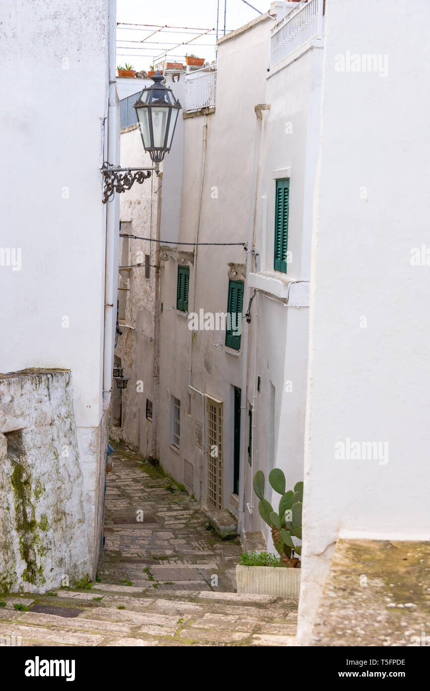Italy, Ostuni, a typical street in the ancient historic center Stock ...