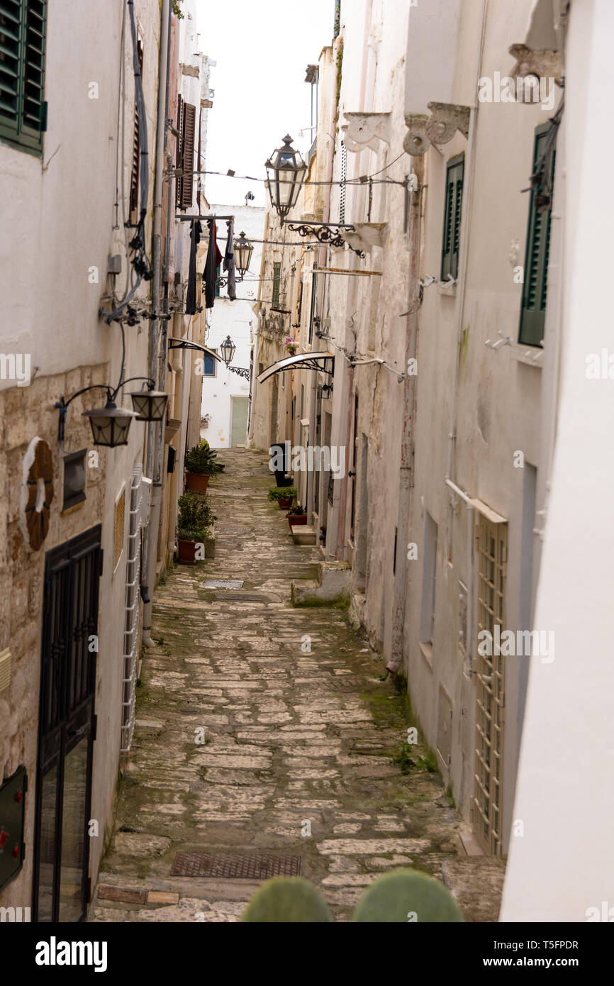 Italy, Ostuni, a typical street in the ancient historic center Stock ...