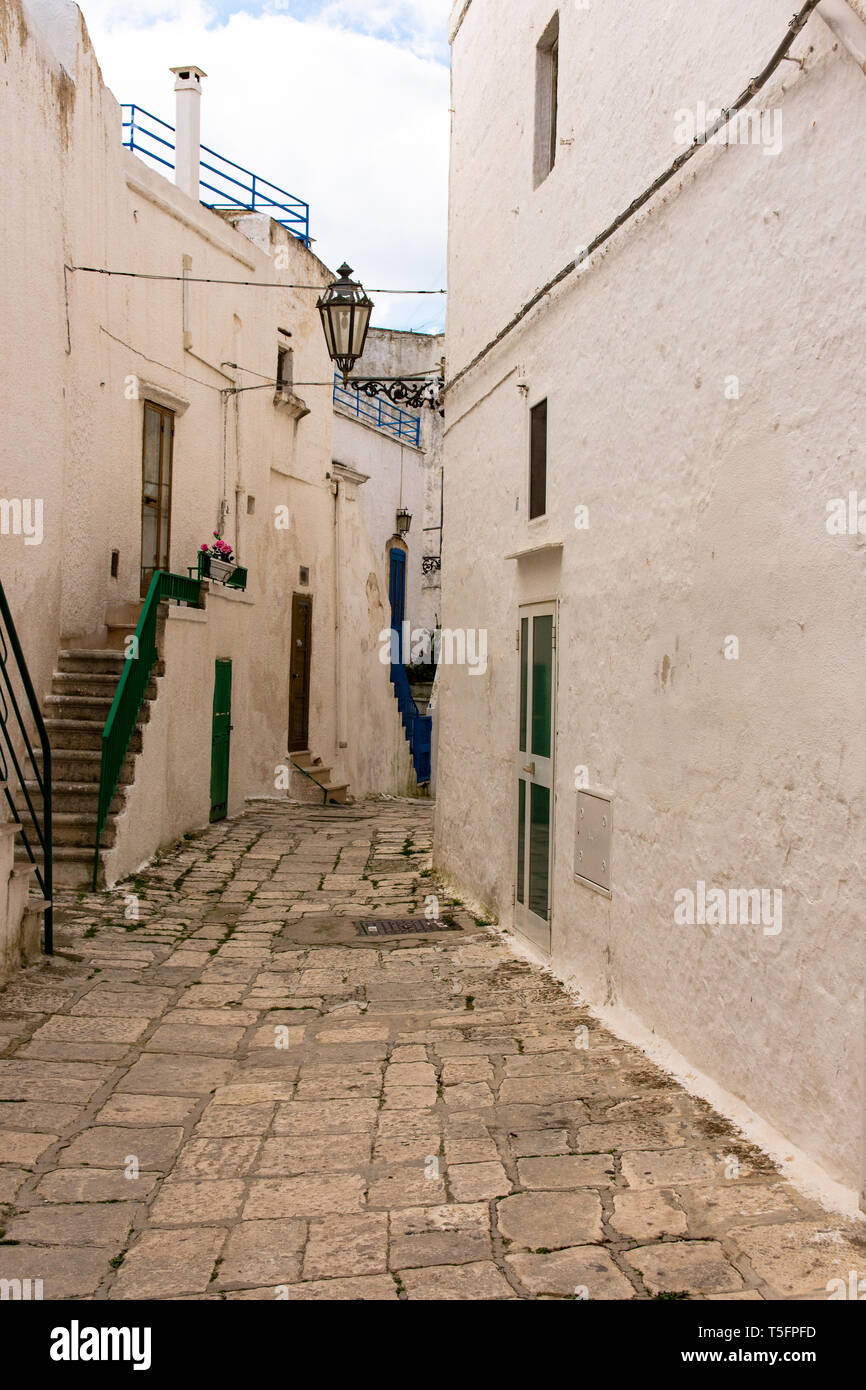 Italy, Ostuni, a typical street in the ancient historic center Stock ...