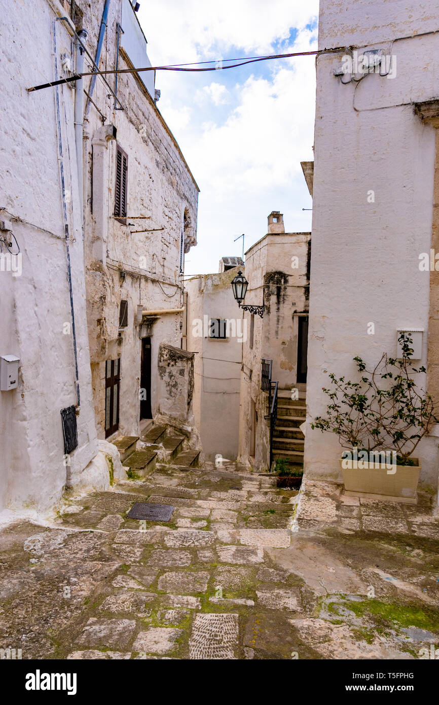 Italy, Ostuni, a typical street in the ancient historic center Stock ...