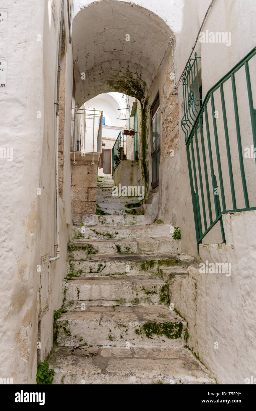 Italy, Ostuni, a typical street in the ancient historic center Stock ...