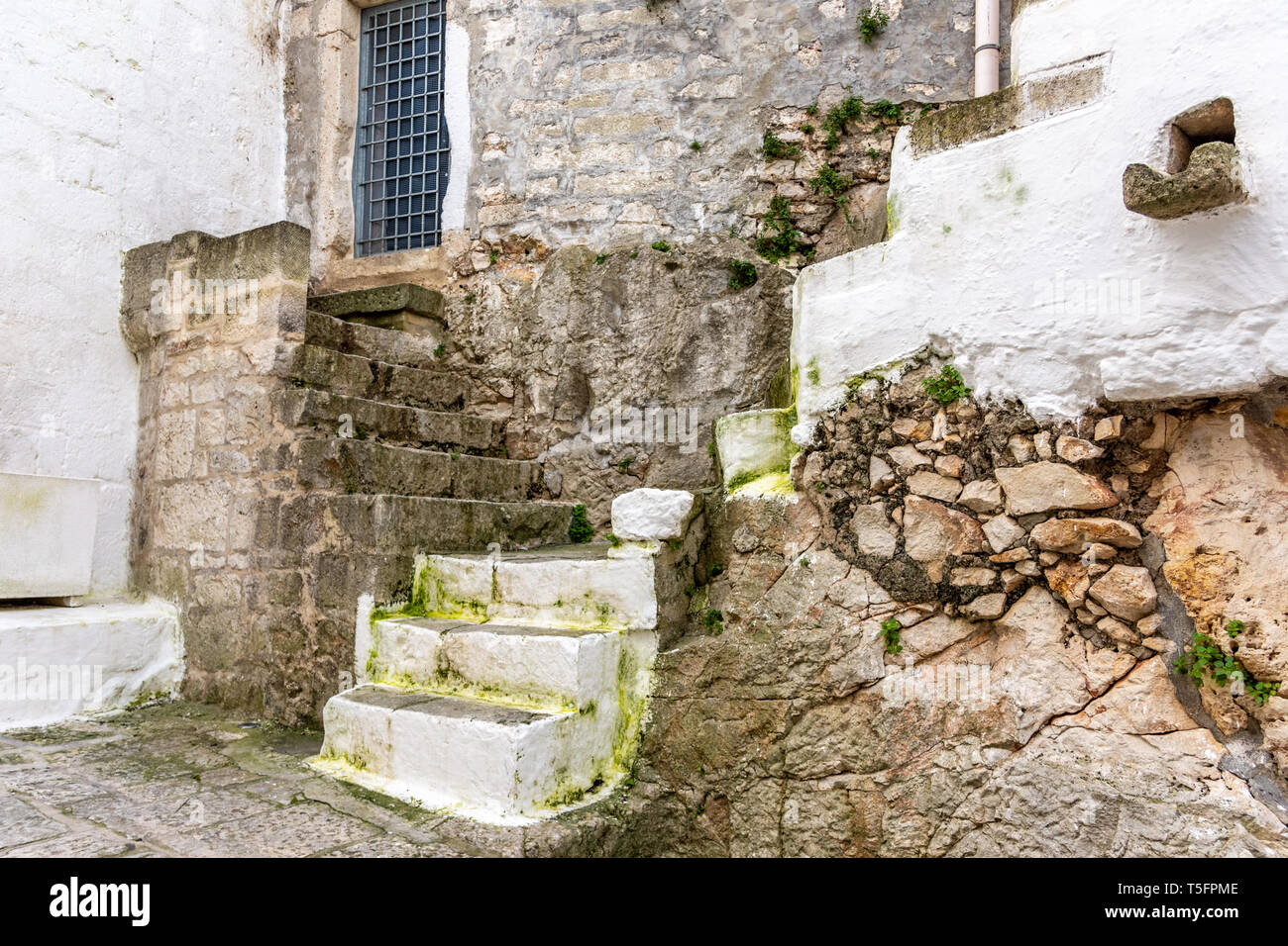 Italy, Ostuni, a typical street in the ancient historic center Stock ...