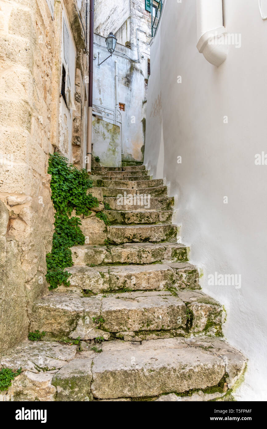 Italy, Ostuni, a typical street in the ancient historic center Stock ...