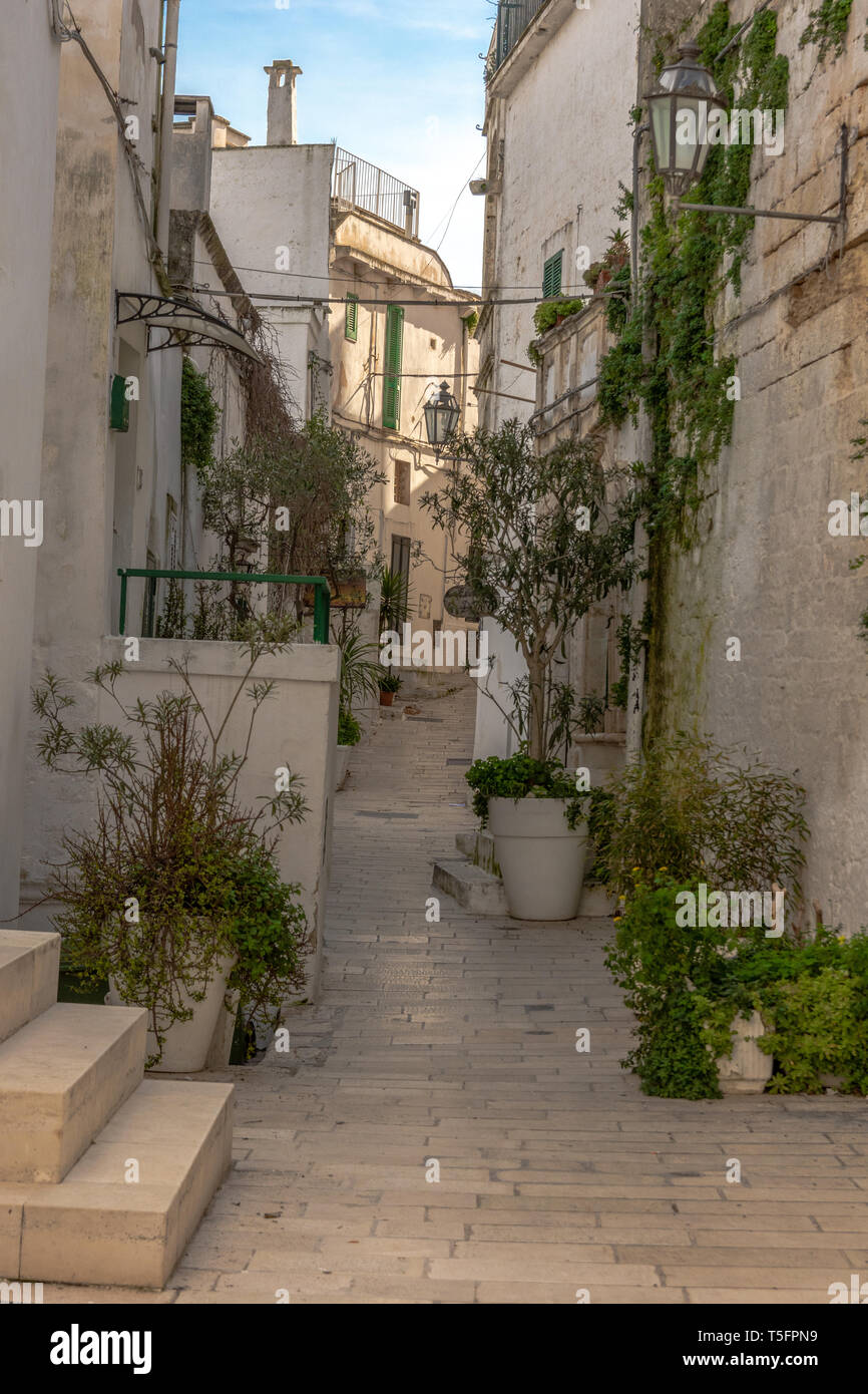 Italy, Ostuni, a typical street in the ancient historic center Stock ...