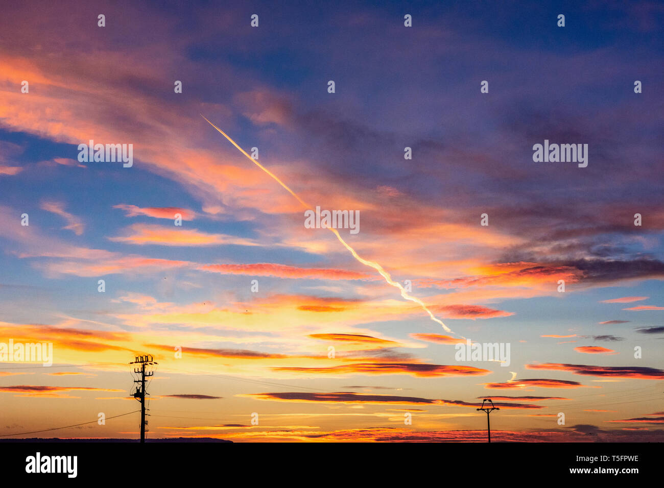 View of a sunset on a road Stock Photo - Alamy