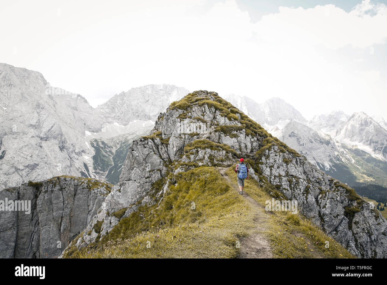 Austria, Tyrol, man hiking on mountain trail Stock Photo - Alamy