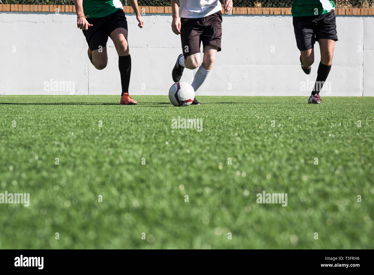Football players legs hi-res stock photography and images - Alamy