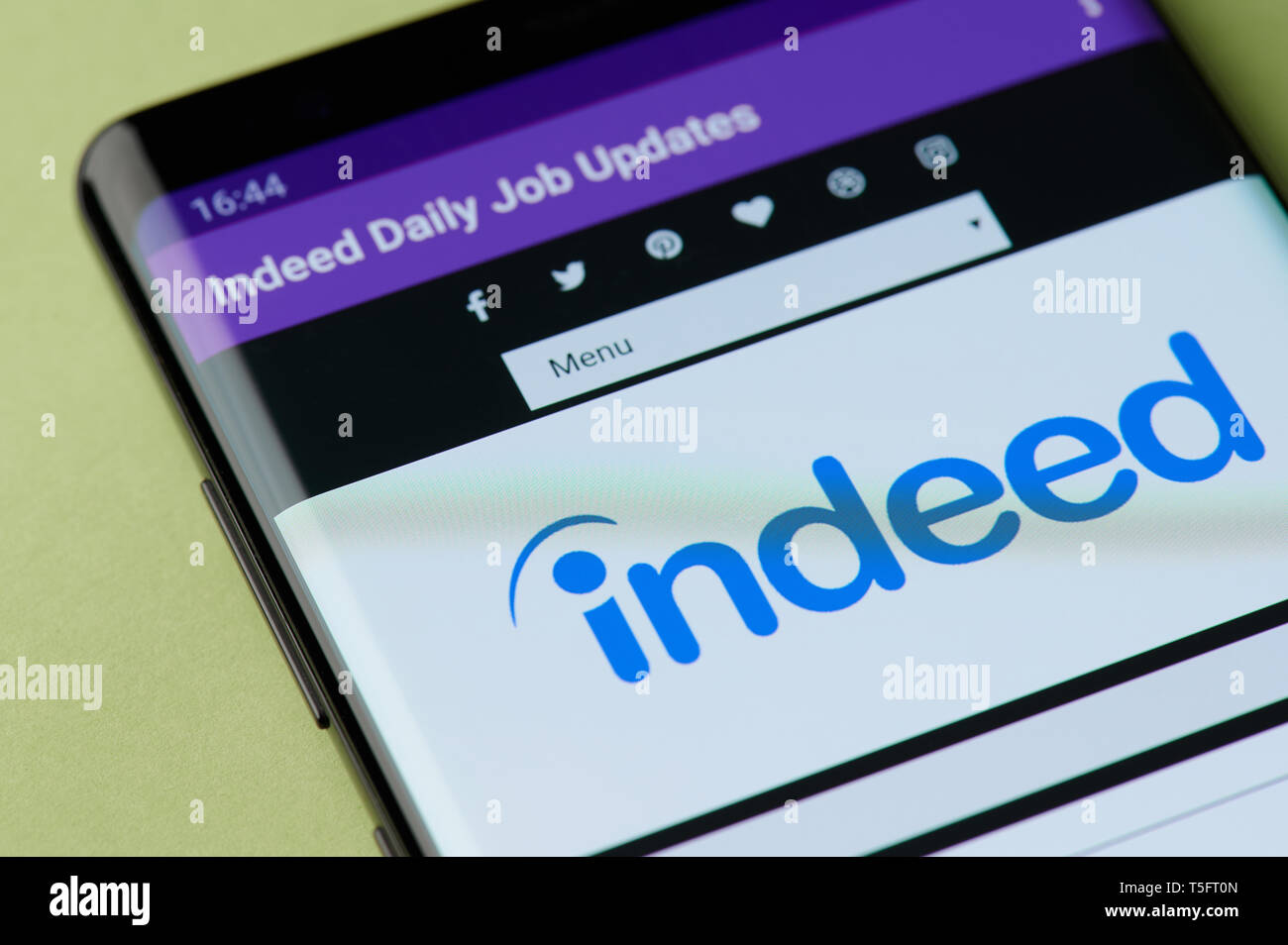 New york, USA - april 22, 2019:Indeed daily job interface on smartphone ...