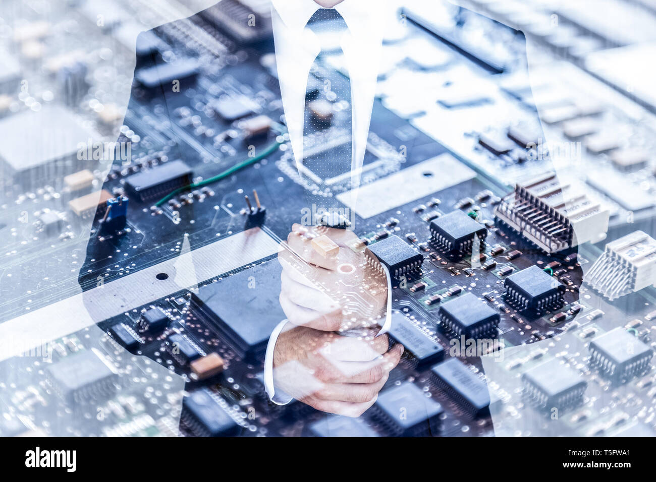 Businessman wearing fashionable classic navy blue suit against pc ...