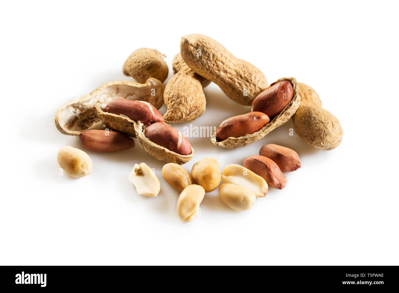Peanuts composition isolated on white background Stock Photo - Alamy