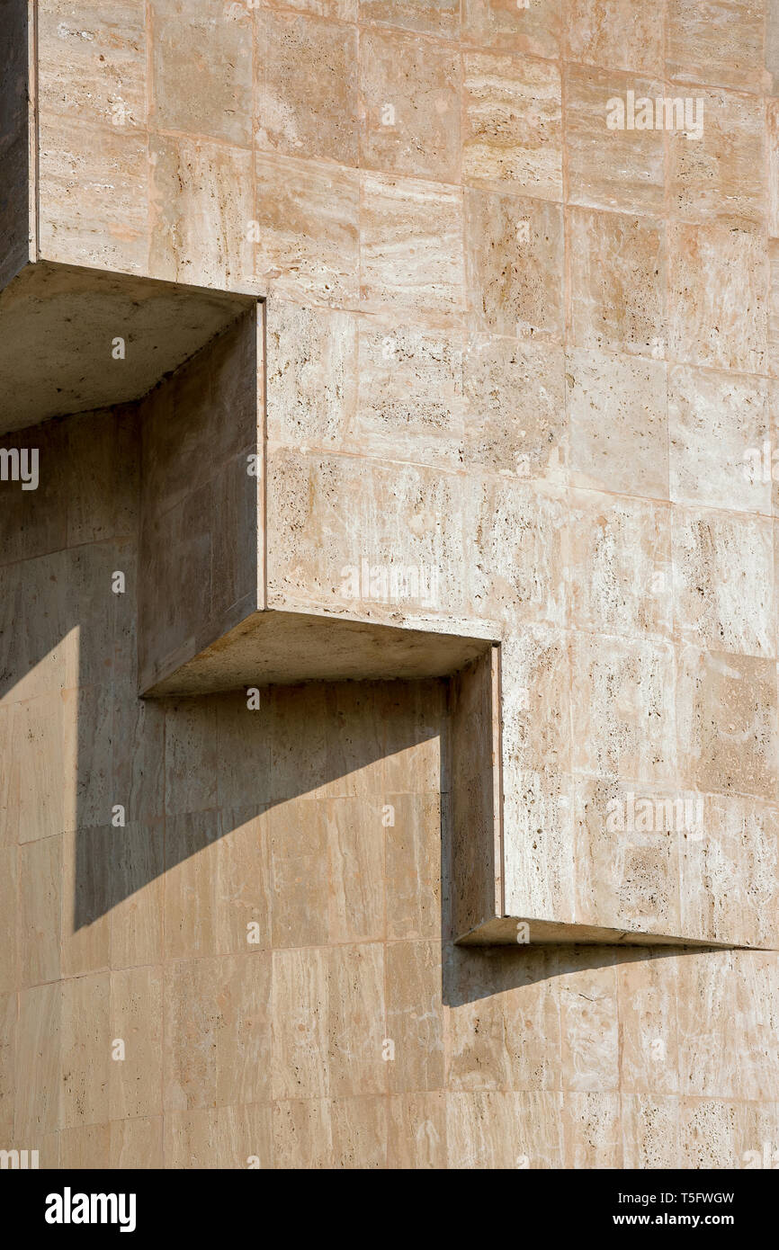 Architecture volume casting shadows on a sandstone facade Stock Photo ...