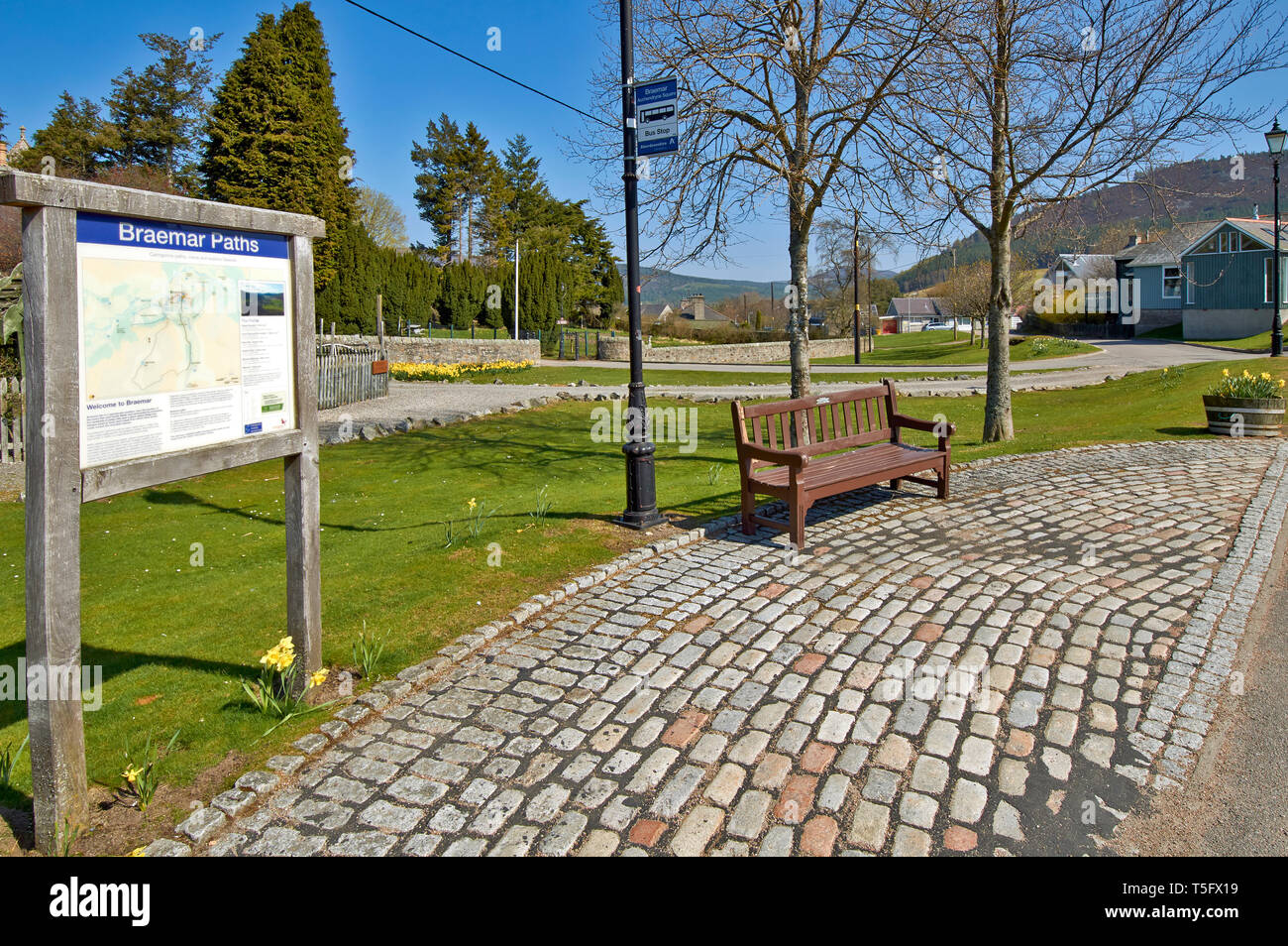 BRAEMAR ABERDEENSHIRE SCOTLAND BUS STOP WITH INFORMATION BOARD SHOWING ...