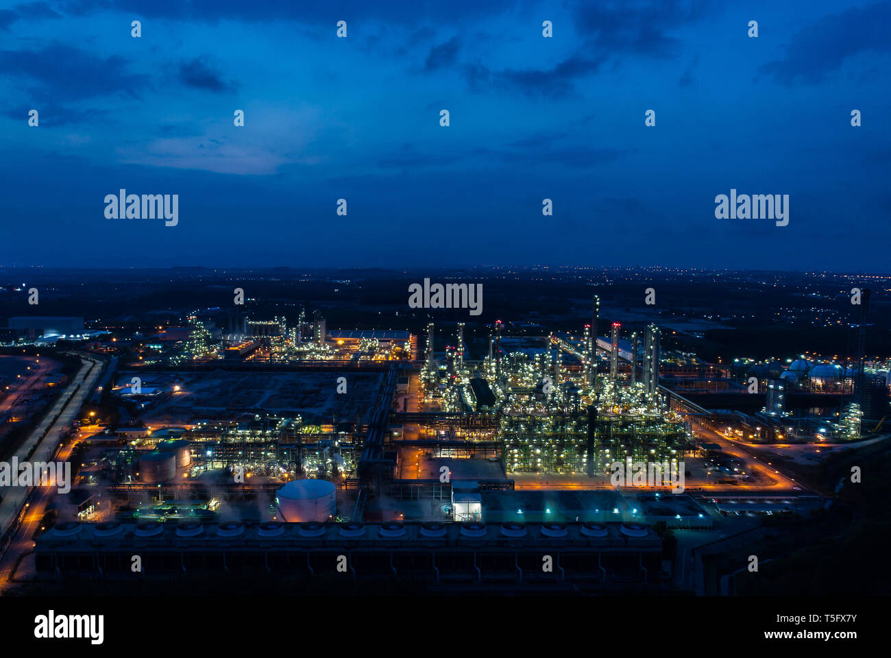 Aerial view night light oil terminal is industrial facility for storage ...