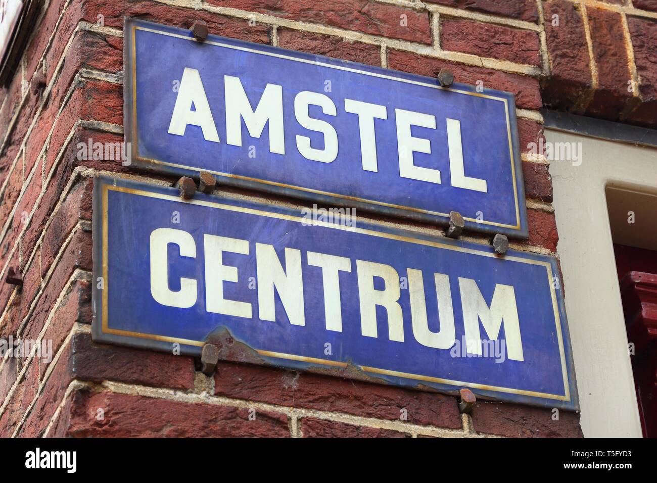 Amsterdam, Netherlands - street name sign. Amstel river Stock Photo - Alamy