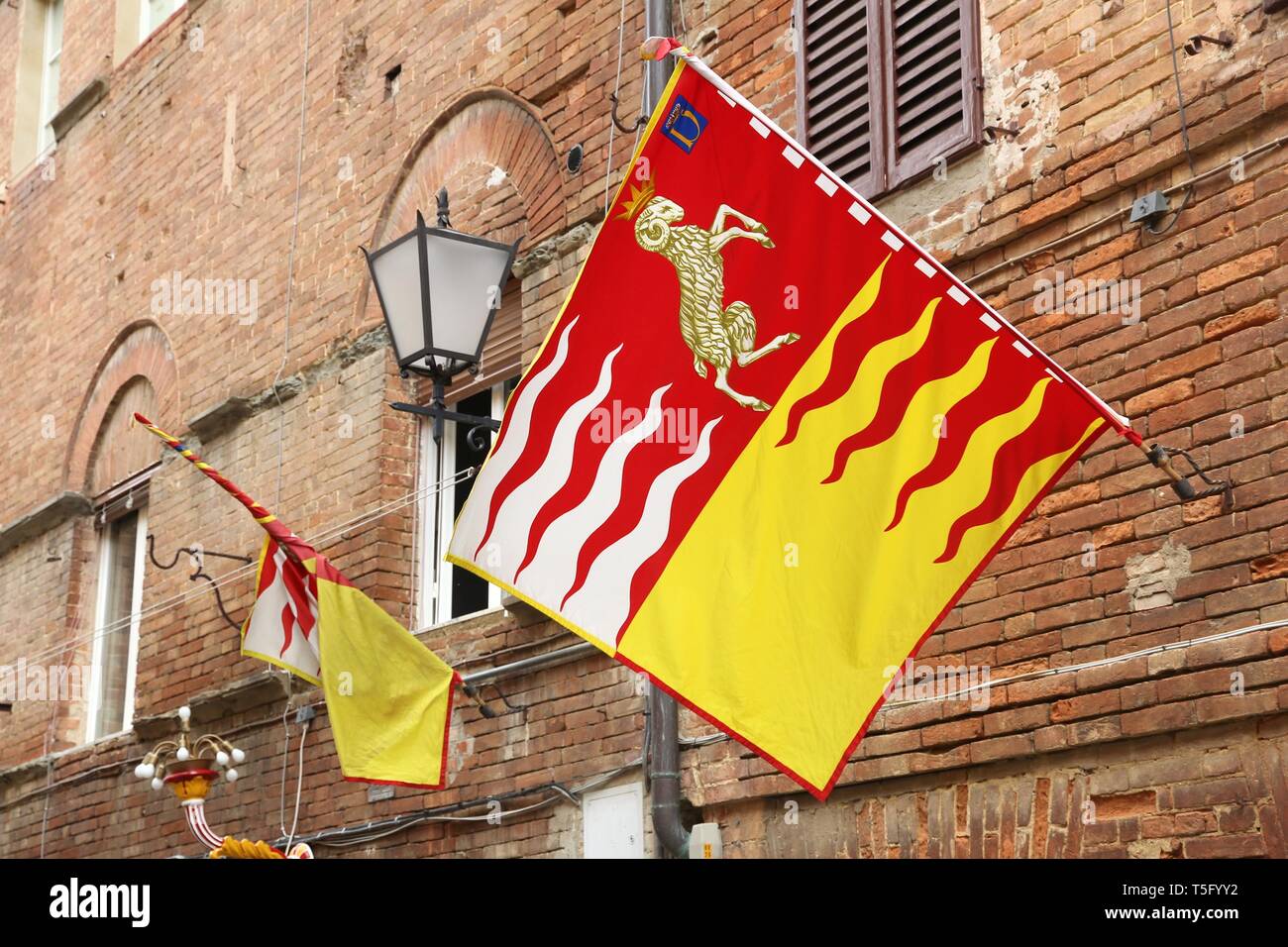 Siena, Italy. Old Town is divided into traditional districts (contrade ...
