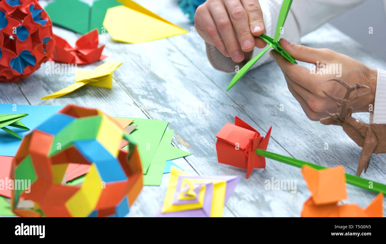 Making paper crane at workshop Stock Photo - Alamy