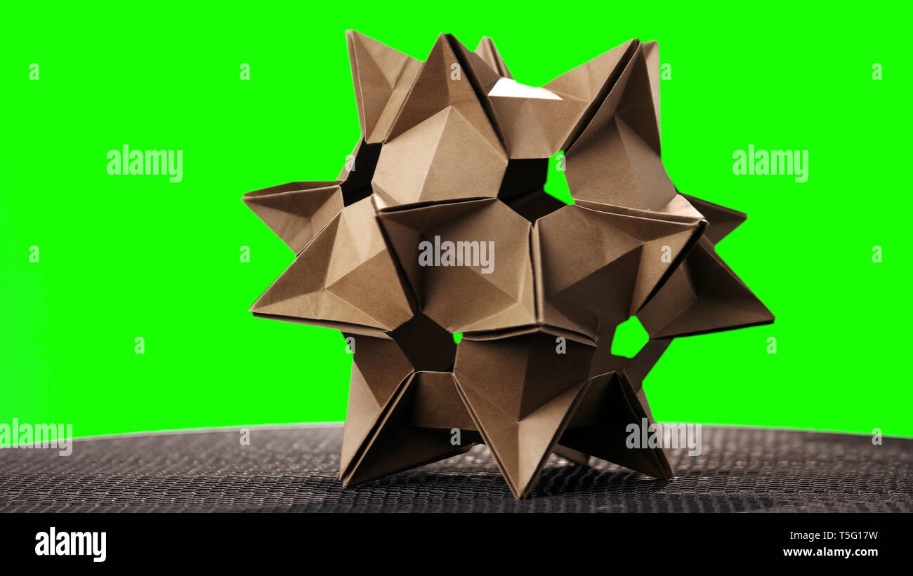 Spiky origami model on green screen Stock Photo - Alamy