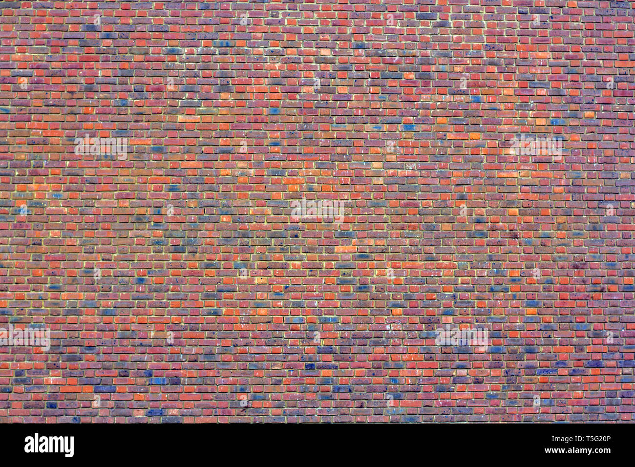 A texture of brick wall. European brickwork. Large red brick wall Stock ...