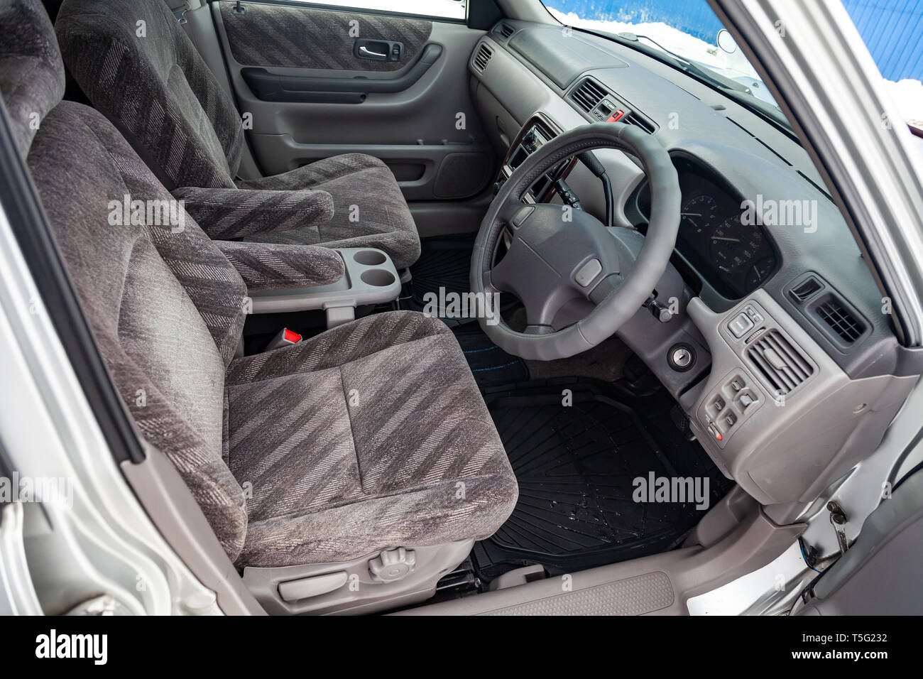 View to the gray color interior of suv car with front seats, steering ...