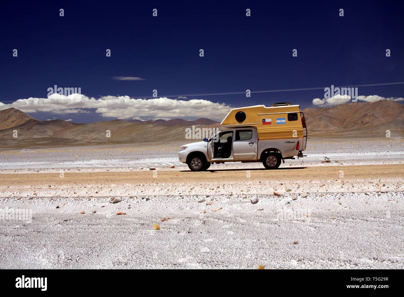 MARICUNGA SALT FLAT PLATEAU, CHILE - DECEMBER 20. 2011.4 wheel camper ...