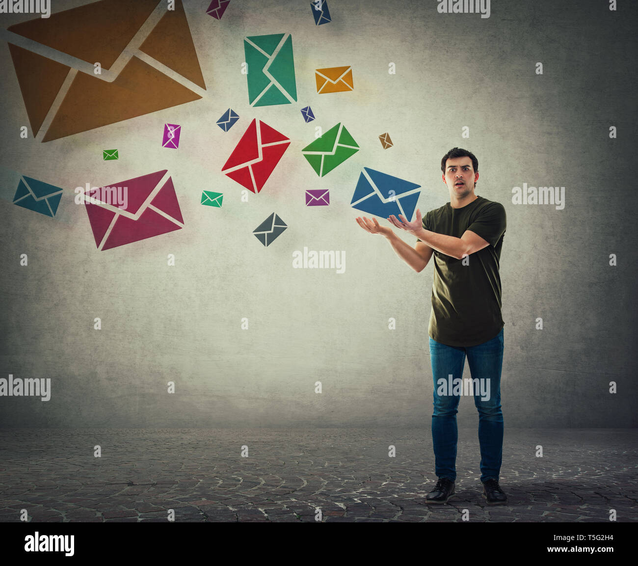 Casual young man, confused face expression, holding hands outstretched ...