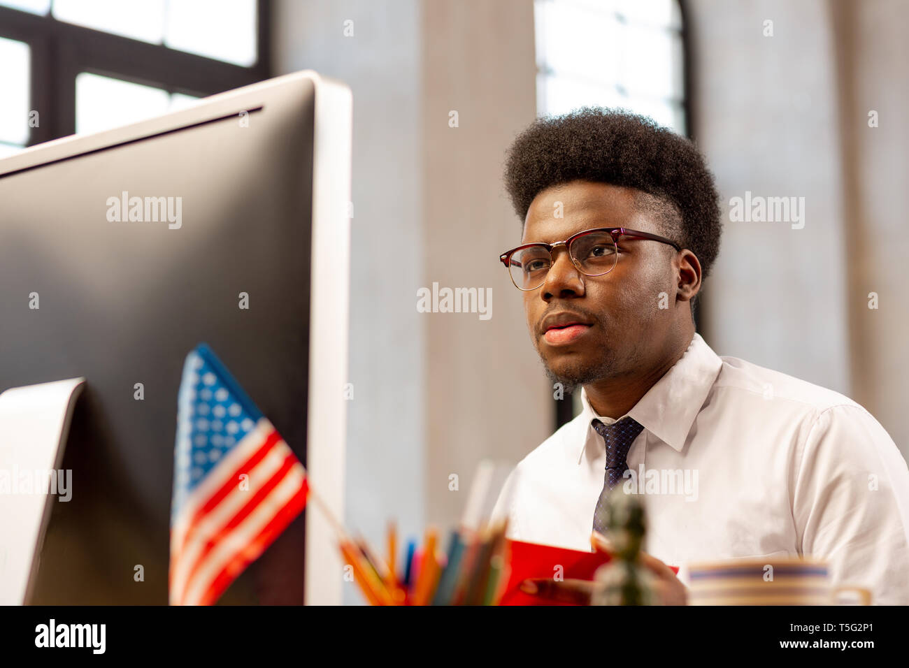 Intelligent African American man being at work Stock Photo - Alamy