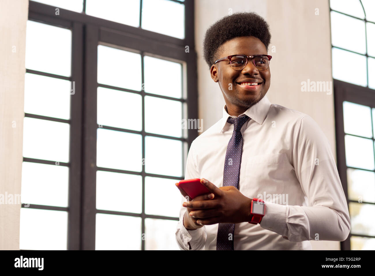Confident intelligent man standing hi-res stock photography and images - Alamy