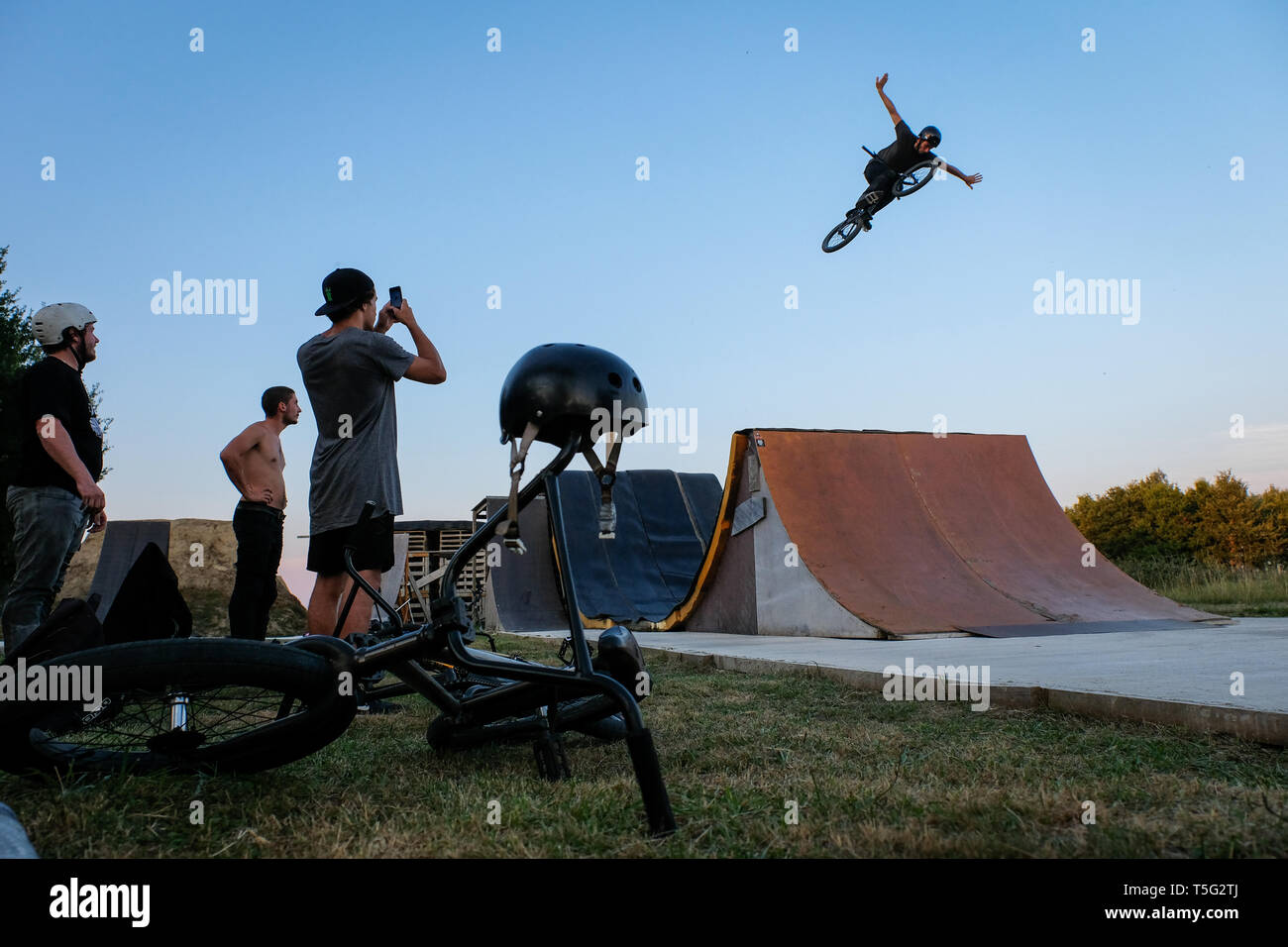 SAINTE-FOY-DE-PEYROLIÈRES, FRANCE - AUGUST 05: a man filming at Istvan ...